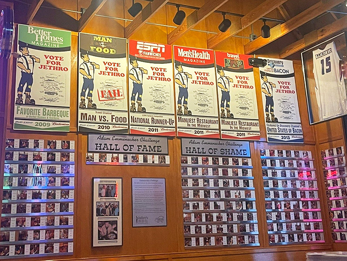 The Wall of Fame showcases brave souls who've attempted food challenges—some triumphant heroes, others delicious casualties of ambition.