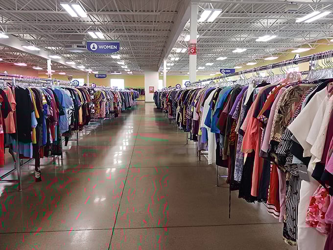Women's clothing stretches as far as the eye can see, a rainbow of possibilities organized with a precision that would make Marie Kondo proud.