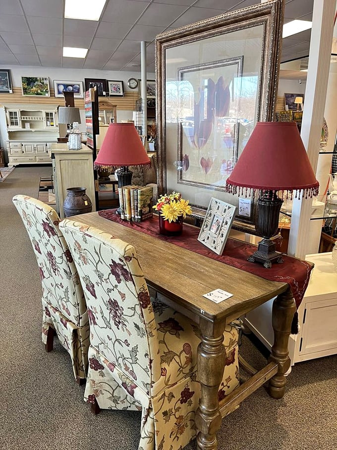 Rustic elegance meets practical design in this console table that's ready to display your family photos or hide the remote.