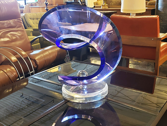 Space-age meets art gallery in this sculptural blue acrylic piece. The perfect conversation starter for when you've run out of weather talk.