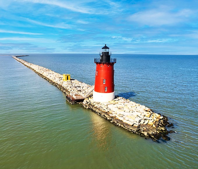 The aerial view reveals what boat captains have known for generations—this red beacon isn't just functional, it's Delaware's most photogenic maritime celebrity.