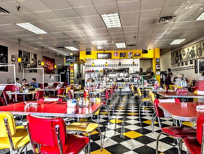 Red and yellow tables pop against the checkerboard floor – a diner so authentically retro, you half expect the Fonz to walk in.