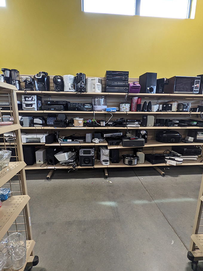 The appliance graveyard—or is it heaven? Coffee makers, stereos, and kitchen gadgets waiting for their second act.