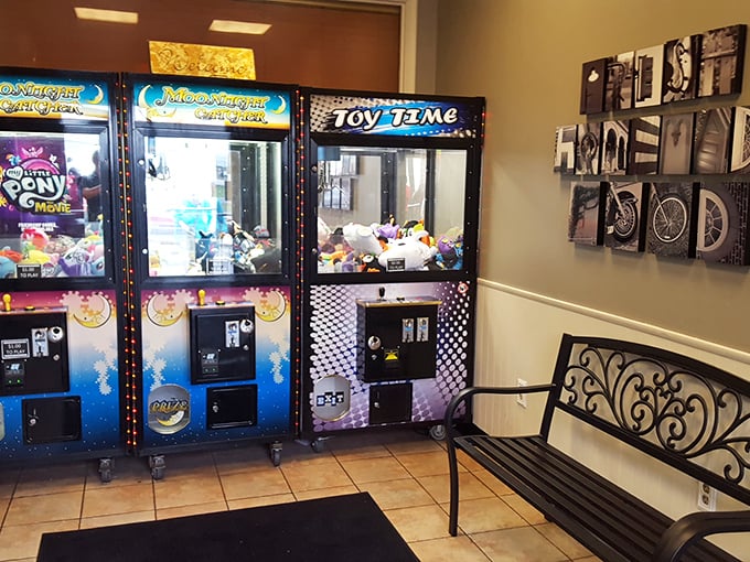 Arcade games in the waiting area—where kids burn off energy and adults pretend they're just "keeping an eye on the children."
