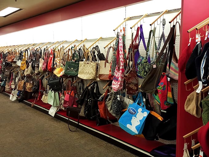The handbag haven—where designer lookalikes mingle with authentic vintage finds in a colorful display that would make any accessory lover swoon.