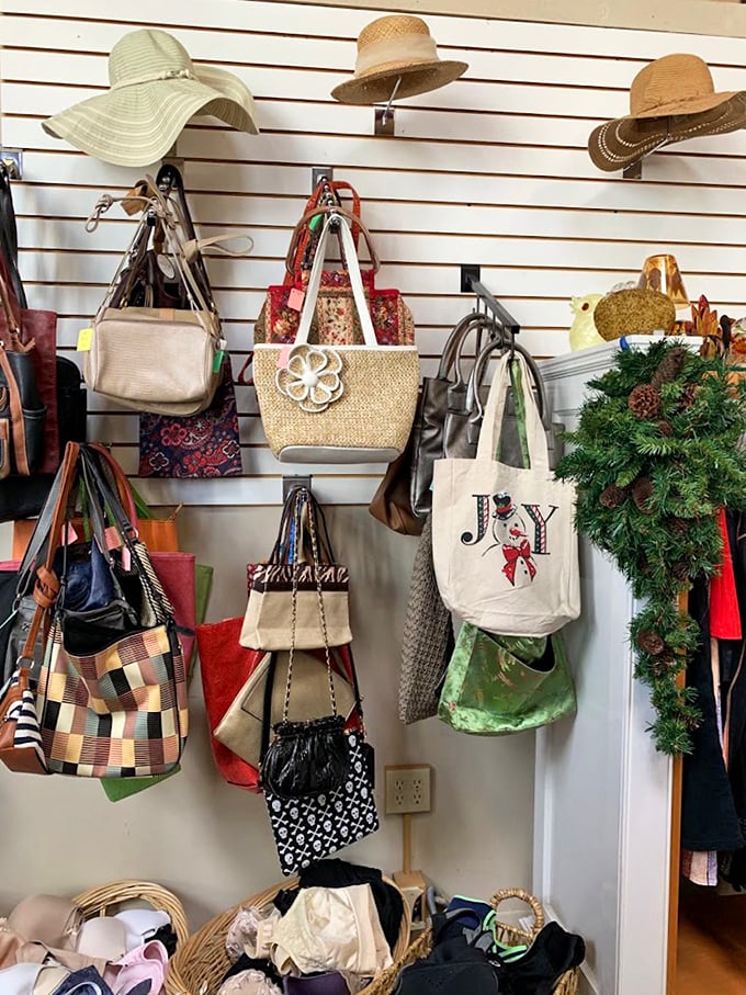 The wall of forgotten purses and sun hats—each one representing a vacation, special occasion, or fashion phase someone once loved.