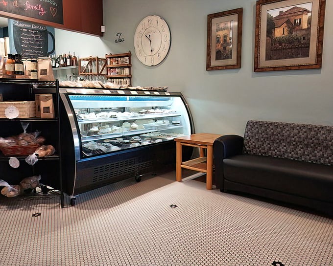 The dessert case—where willpower goes to die. Each pastry and cake sits like a sweet possibility, daring you to save room after that turkey dinner.