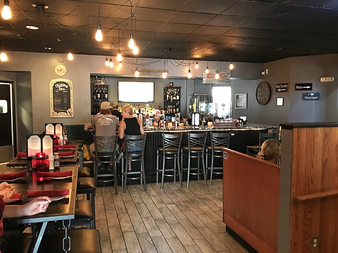 The bar area—where strangers become friends and friends become family over properly poured libations. 