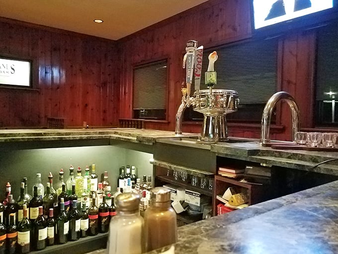 The bar area—where liquid courage meets culinary adventure. A well-stocked lineup promising good times and loosened belts.