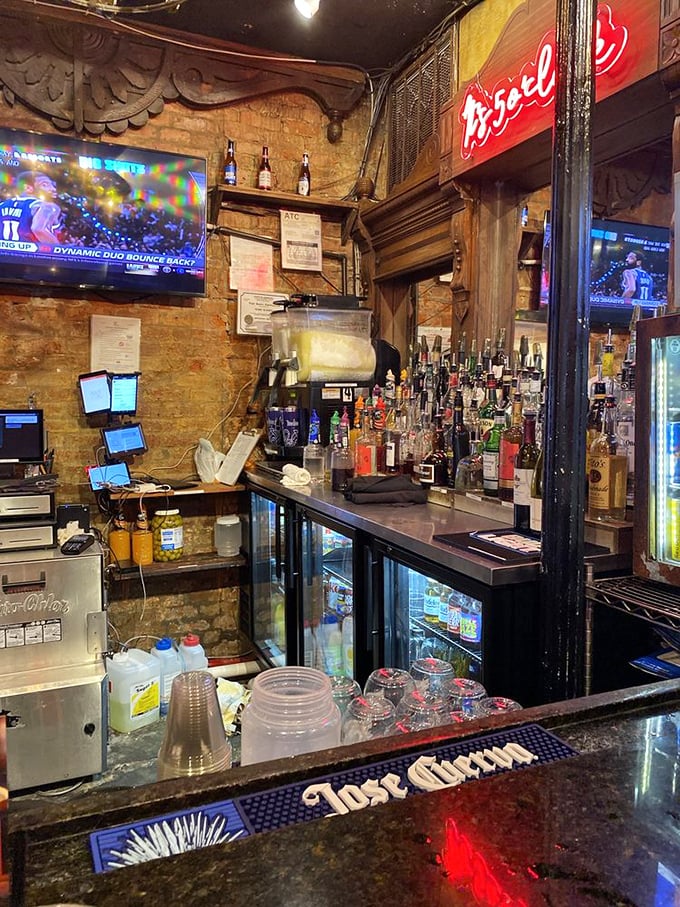 The bar isn't just serving drinks—it's crafting liquid souvenirs of New Orleans that taste even better than they look.