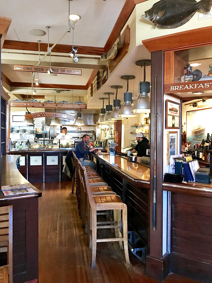 The bar where strangers become friends and friends become regulars. Notice the "Cold Beer Wine To Go" sign—they know what matters.