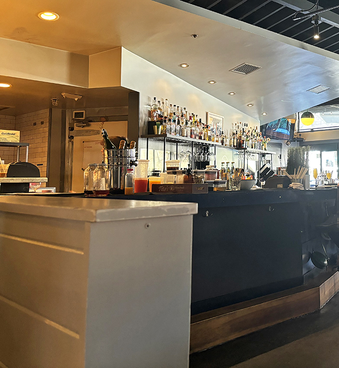 Behind this bar, mixologists craft liquid poetry that perfectly complements the kitchen's culinary prose—a partnership of spirits in every sense.