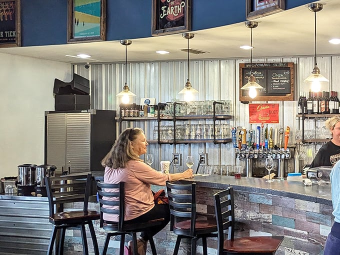 The bar area—where morning coffee drinkers and evening wine sippers cross paths in a beautiful dance of caffeinated and fermented pleasures.