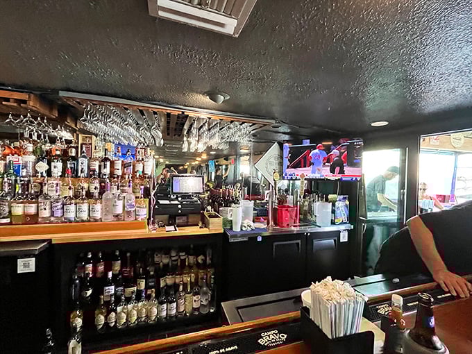 The bar doesn't just serve drinks; it serves possibilities—each bottle a potential story waiting to be poured.