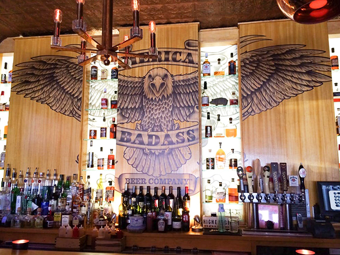 The bar's eagle artwork watches over bottles like a guardian of good times, promising libations worthy of pairing with smoky treasures.