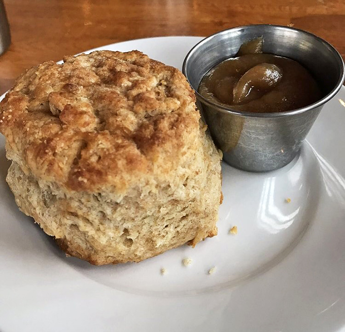 This isn't just a biscuit – it's a buttery, flaky monument to the art of baking, accompanied by apple butter that tastes like fall memories.