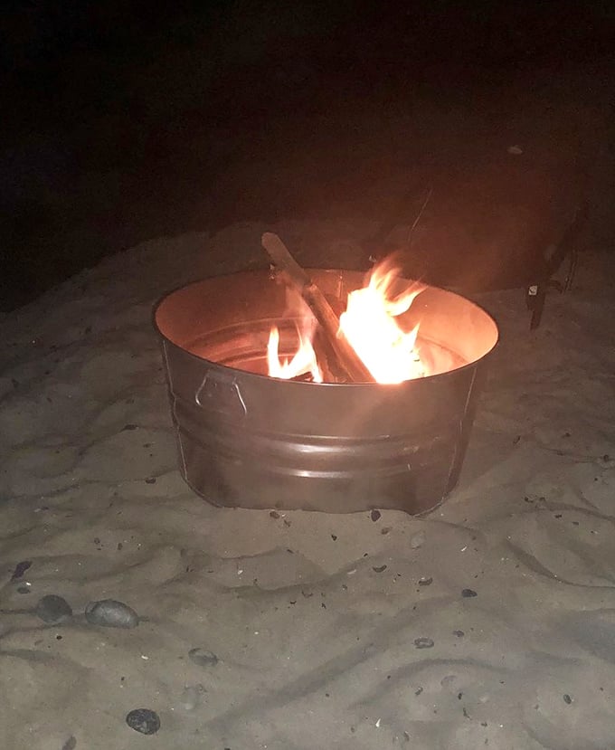 Beach bonfires: where s'mores taste better, stories grow taller, and nobody minds that they'll be finding sand in their shoes for weeks.