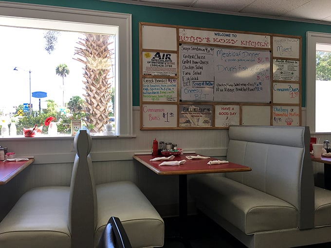 Booth seating with a view of the daily specials board—a front-row seat to the possibilities that await your taste buds.