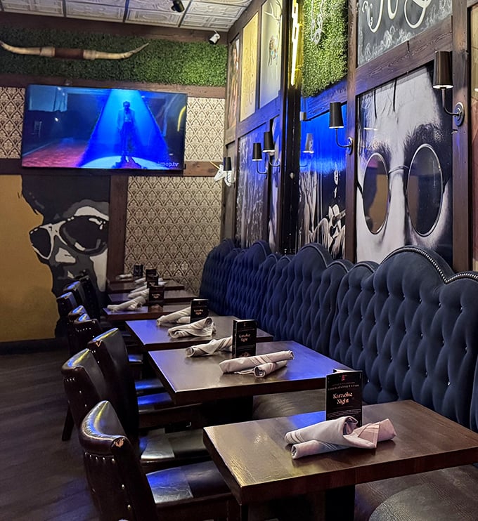 Rock-star portraits watch over diners in this moody blue booth section. Even the walls seem to know you're about to have a memorable meal.