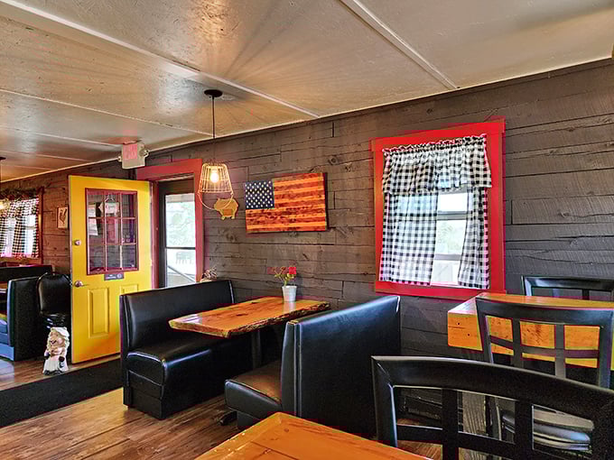 Red-trimmed windows and wooden walls create that quintessential American BBQ joint feel – like you've stumbled into a delicious time capsule.