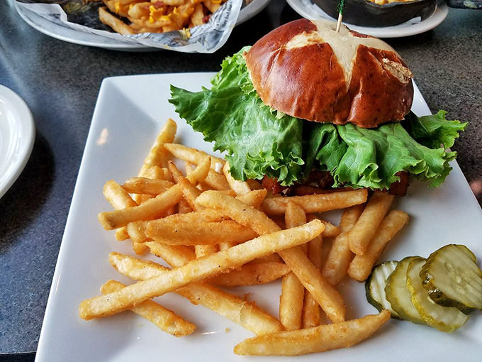 This isn't just a burger—it's architecture with lettuce. The brioche bun deserves its own appreciation society.