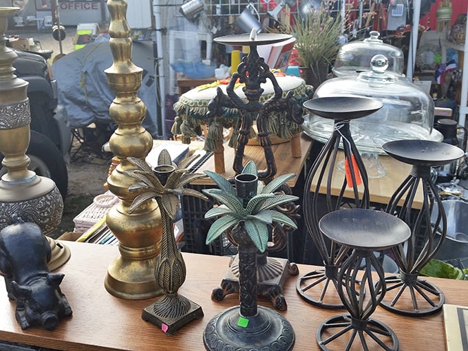 Vintage meets eclectic in this collection of brass and metal decor. That palm tree candleholder screams "coastal chic" with a wink.