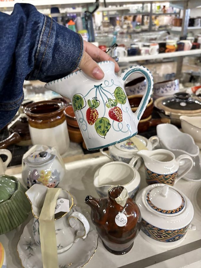 This strawberry pitcher isn't just ceramic—it's someone's grandmother's Sunday brunch poured into tangible form. Pour your memories accordingly.