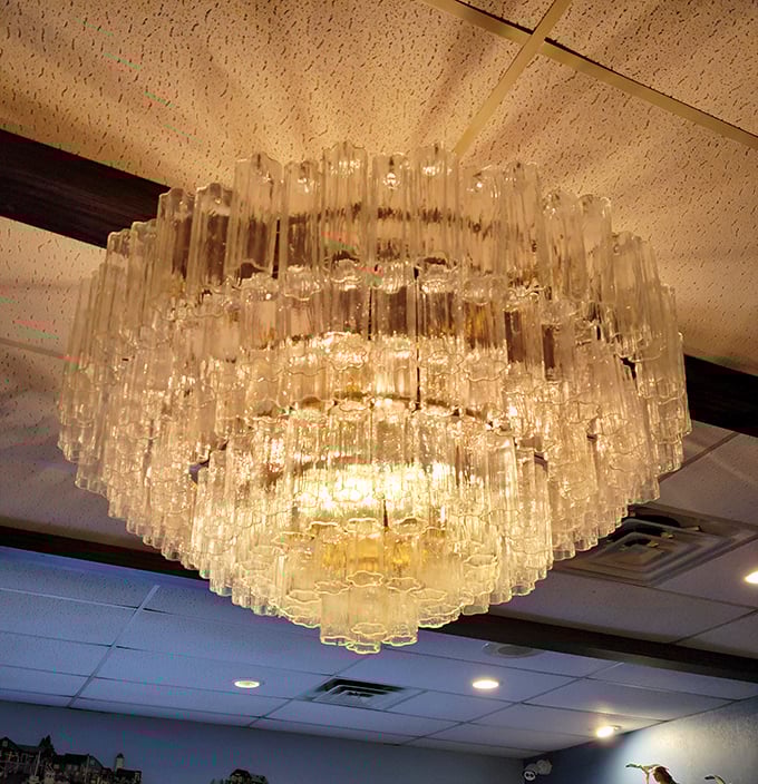 That chandelier didn't come from a diner supply catalog – it's the crown jewel that says, "We're fancy... but still serve scrapple."