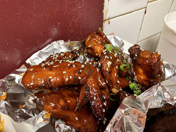 Wings that have clearly earned their doctorate in flavor, glazed to perfection and sprinkled with sesame seeds for that extra textural pop.