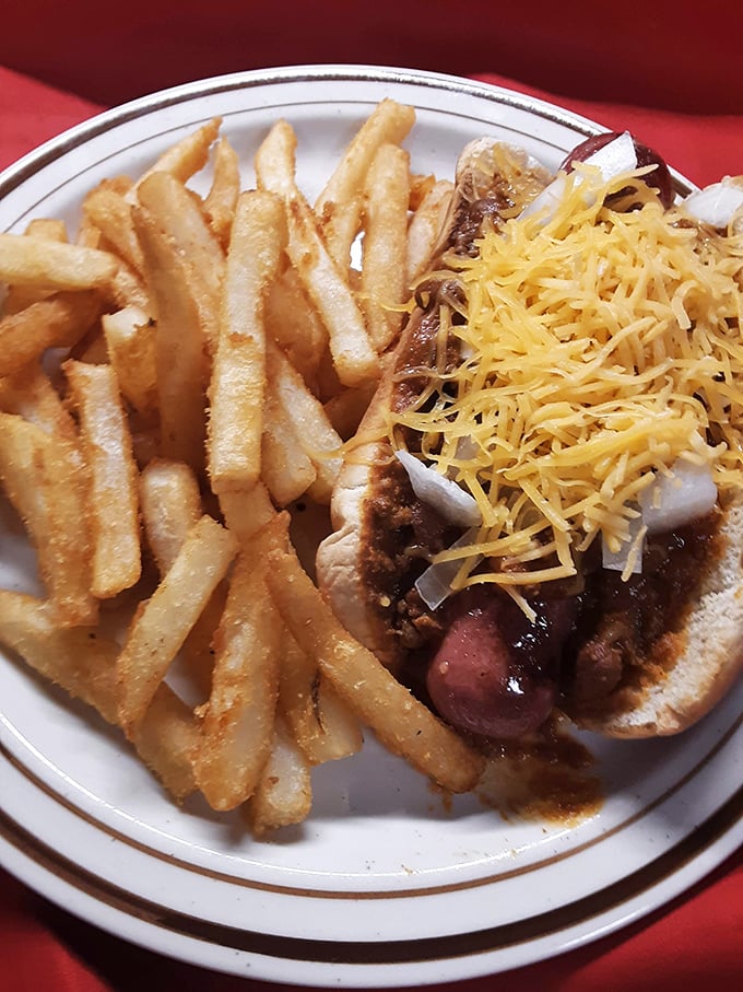 This chili cheese dog with golden fries isn't just lunch—it's edible nostalgia that takes you back to the best summer day of your childhood.