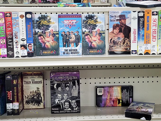 The VHS section—a nostalgic time warp where "Top Gun" and "Casablanca" sit side by side like old friends.