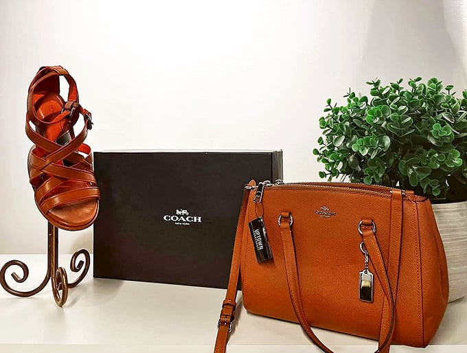 The Coach collection that doesn't require a second mortgage. Orange is the new black when it comes to this pristine designer find.
