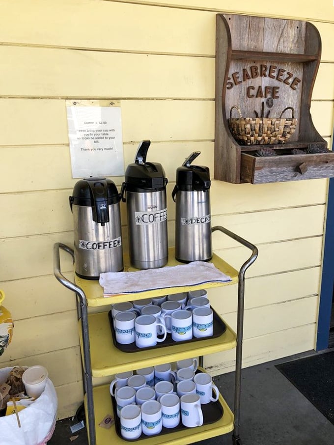 The coffee station—where those silver carafes hold the liquid motivation you'll need for that post-breakfast beach walk.