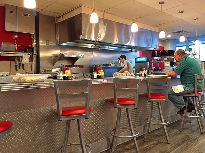 Counter seating: where solo diners become part of the breakfast ballet, watching short-order magic unfold just feet away.