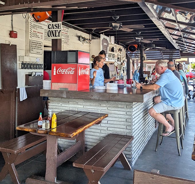 Where Florida's seafood magic happens—simple counter service with no pretense, just the promise of smoky deliciousness to come.