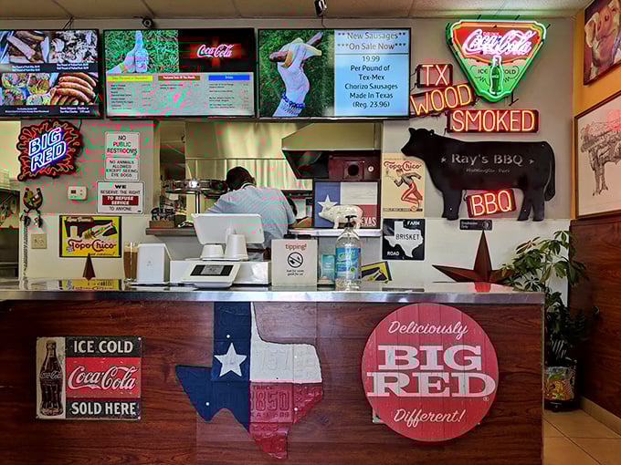The counter where dreams come true, decorated with Texas pride and neon promises. That cow silhouette isn't just decoration—it's a memorial.