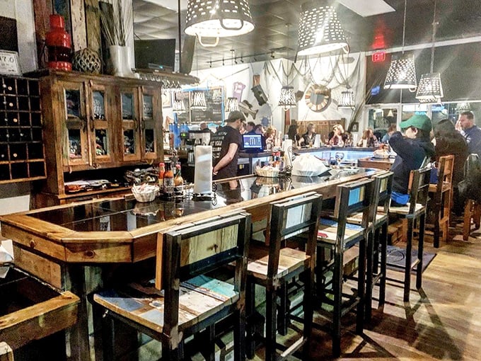 This isn't just a bar counter—it's the front row to culinary theater where every seat gives you VIP access to seafood magic.