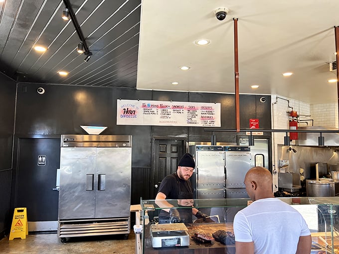 Where barbecue magic happens: the counter where smoked treasures are sliced, weighed, and passed to eager hands.