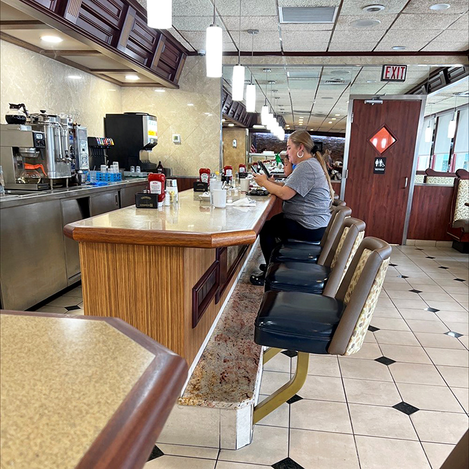 Where strangers become regulars and regulars become family—the counter where Philadelphia solves its problems one coffee refill at a time.