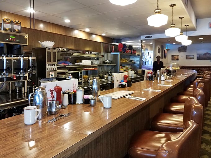 The counter—where solo diners find community, coffee cups are never empty, and the short-order ballet unfolds before your eyes.