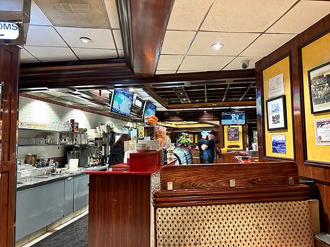 Where the magic happens – the counter view offers a glimpse into the orchestrated chaos that somehow produces your perfect breakfast, every time.