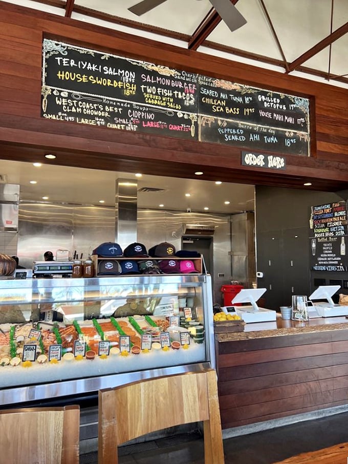 At this counter, ordering isn't just a transaction—it's the beginning of a beautiful friendship between you and whatever was swimming yesterday.