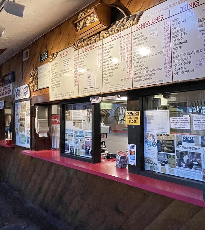 The order counter—where dreams are placed and seafood magic begins. Notice how nobody's checking their phones? That's anticipation.
