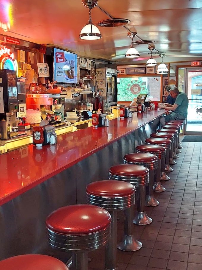 The counter experience—where solo diners become part of the Red Arrow family and watching the grill masters work becomes dinner and a show.