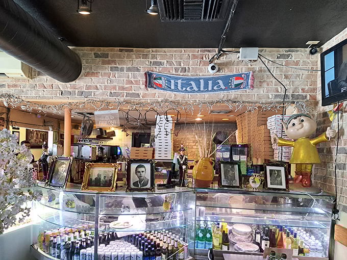 The counter display is a treasure trove of Italian delights, where photographs and memorabilia create a sense of heritage alongside tempting treats.