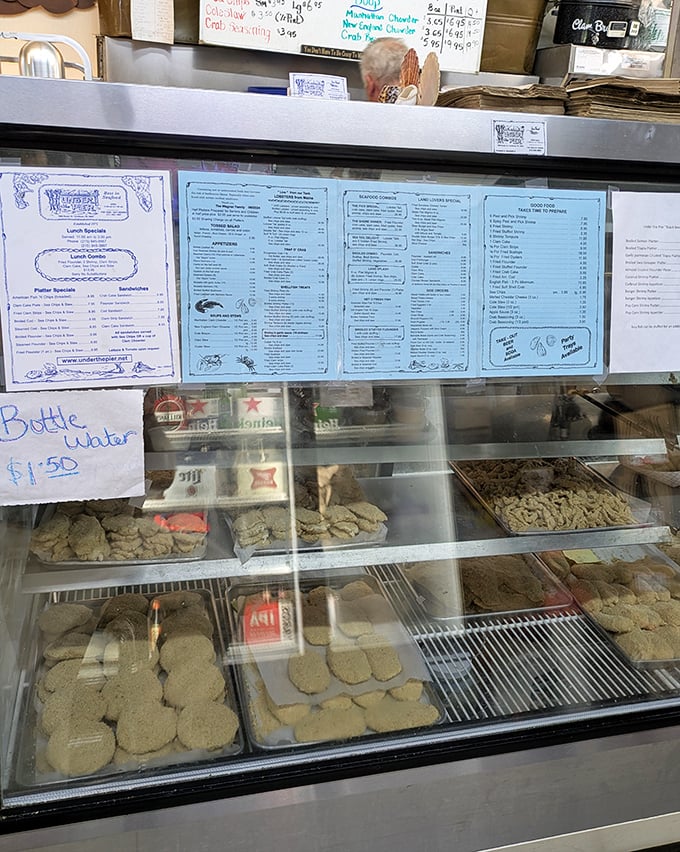 Behind this counter, seafood dreams become reality. Those crab cakes waiting in the display case are practically begging to meet their destiny on your plate.