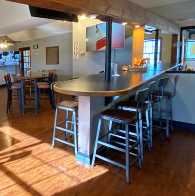 Counter seating bathed in golden sunlight – where BBQ dreams and afternoon beams come together for a perfect Colorado dining moment.