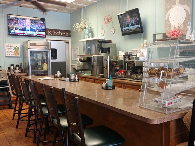 The counter seating—where solo diners become temporary family and the breakfast show unfolds before your eyes like delicious morning theater.
