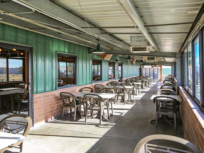 The covered patio offers al fresco dining without sacrificing comfort—a perfect option when Colorado's famous sunshine makes an appearance.
