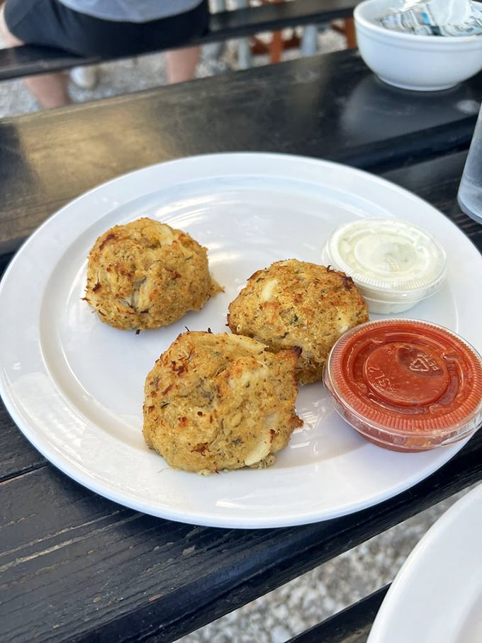 Crab cakes that actually taste like crab—a revolutionary concept that Belle Isle has mastered while others still stuff them with filler.